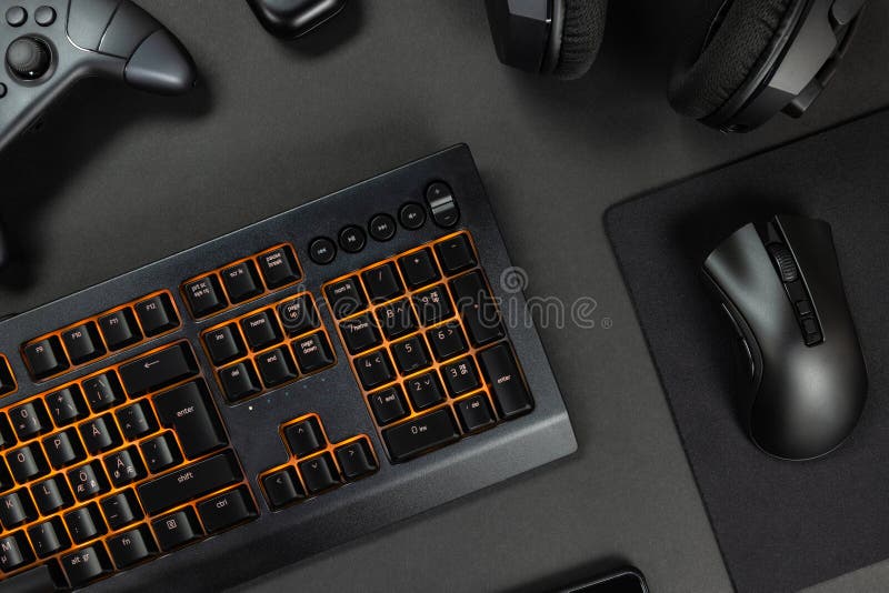 Orange Lit Keyboard by Various Wireless Gadgets Stock Image - Image of ...