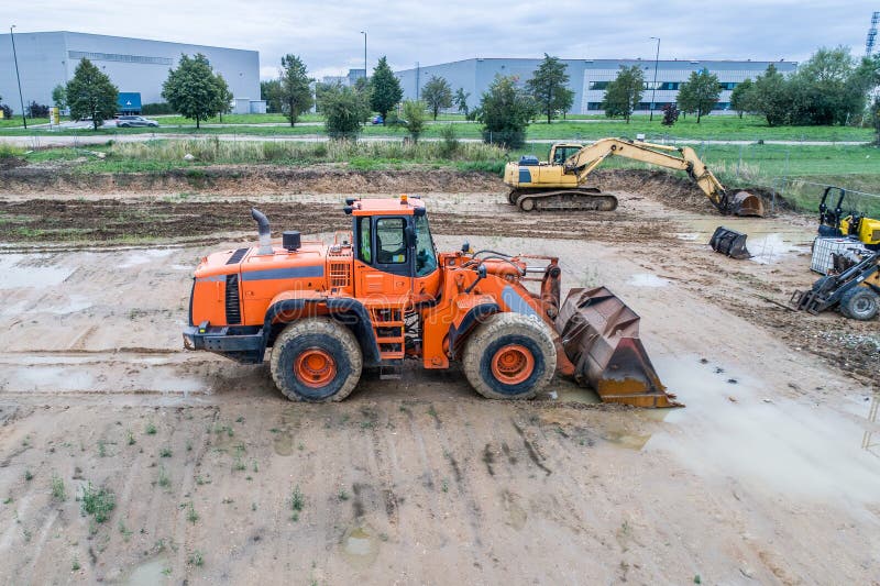 Orange Loader Bulldozer in the Mud Stock Image - Image of view ...