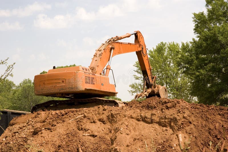 Orange Loader Digging in Dirt Stock Image - Image of construction ...