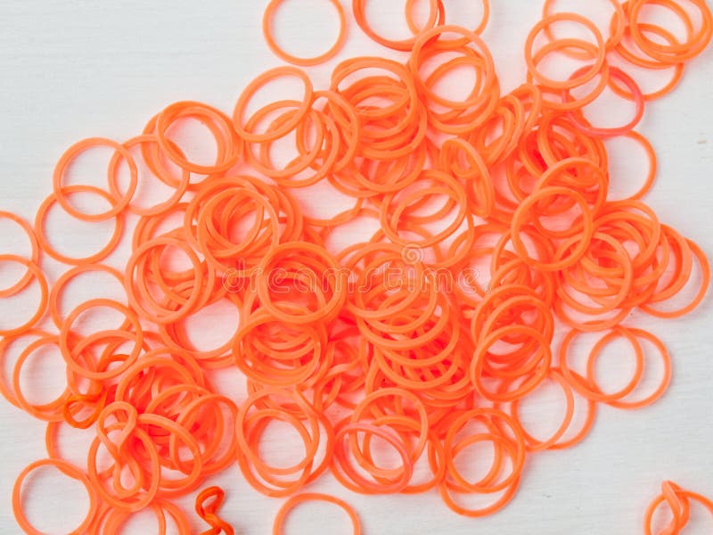 Orange loom bands stock photo. Image of elastics, banding - 42670438