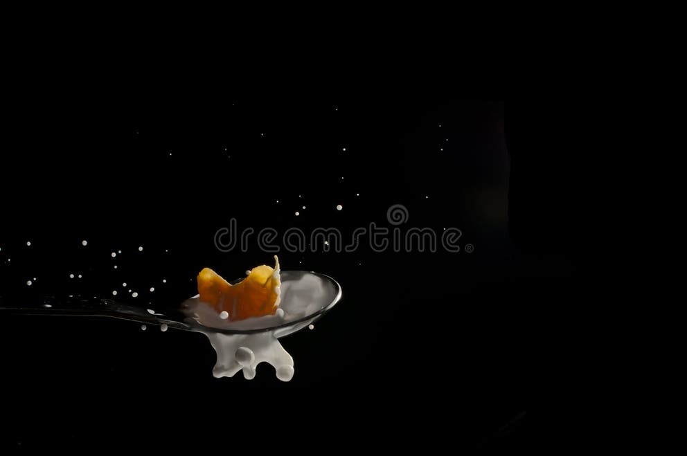 Orange / Mandarin Splashing Milk Stock Photo - Image of milk, sprinkle ...