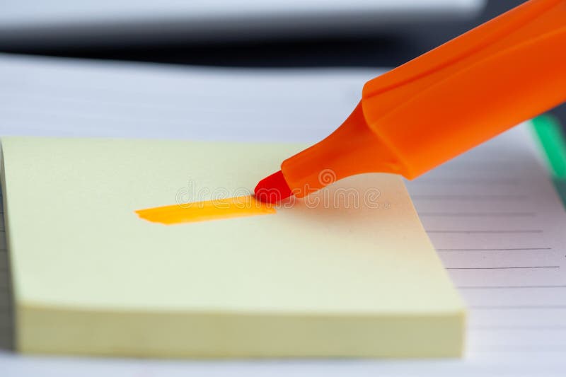 Orange marker on the paper stock image. Image of school - 360222035