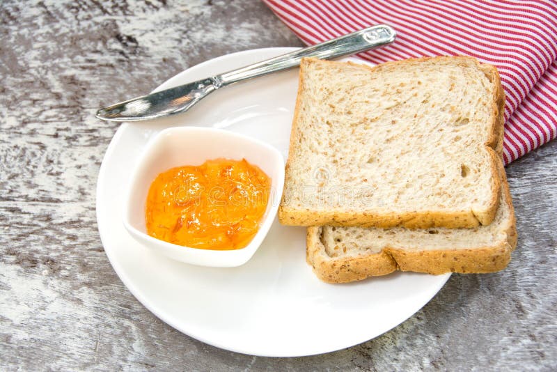Orange Marmalade and Bread for Breakfast Stock Photo - Image of ...