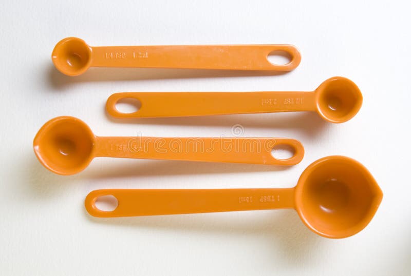 Orange Measuring Spoons, Stacked Stock Image - Image of kitchen ...