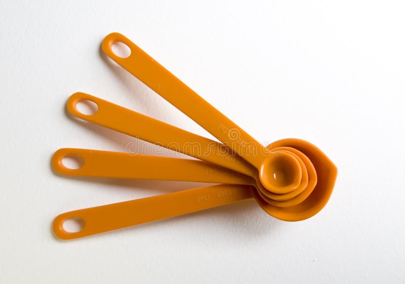 Orange Measuring Spoons, Stacked Picture. Image: 9051231