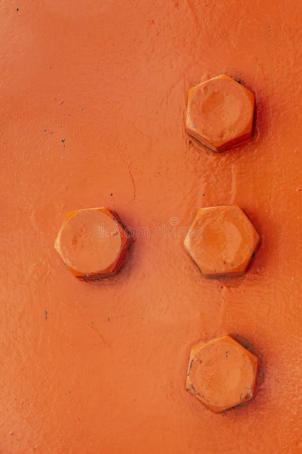 Orange Metal Background with Orange Painted Screws Stock Image - Image ...