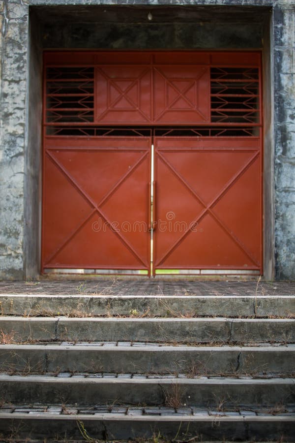 Orange metal gate stock image. Image of backdrop, wall - 79894977