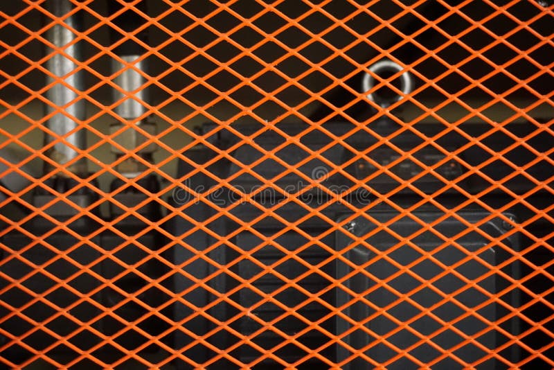 Orange metal mesh stock photo. Image of black, grid, material - 92158532