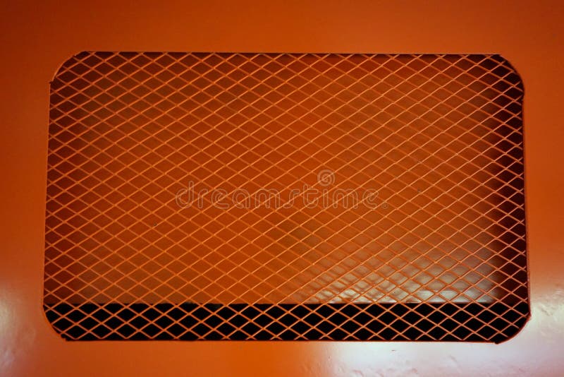 Orange metal mesh stock photo. Image of black, grid, material - 92158532