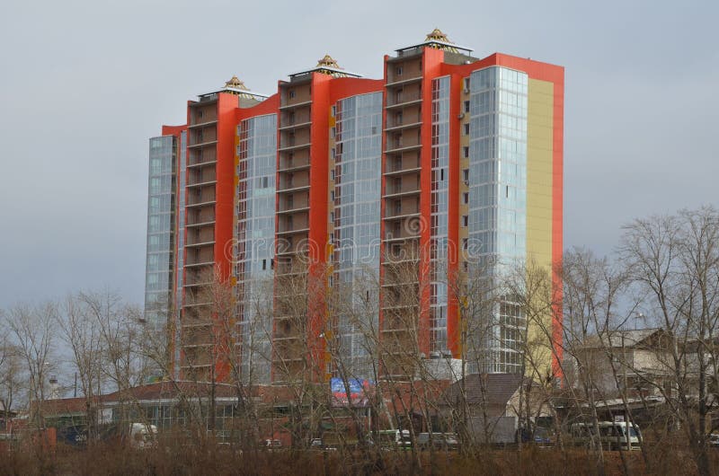 An orange modern building stock image. Image of branch - 130016057