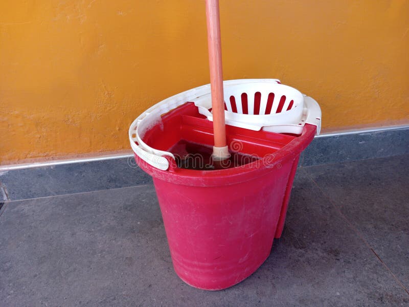 An Orange Mop in a Red Mop Bucket Stock Image - Image of microfiber ...
