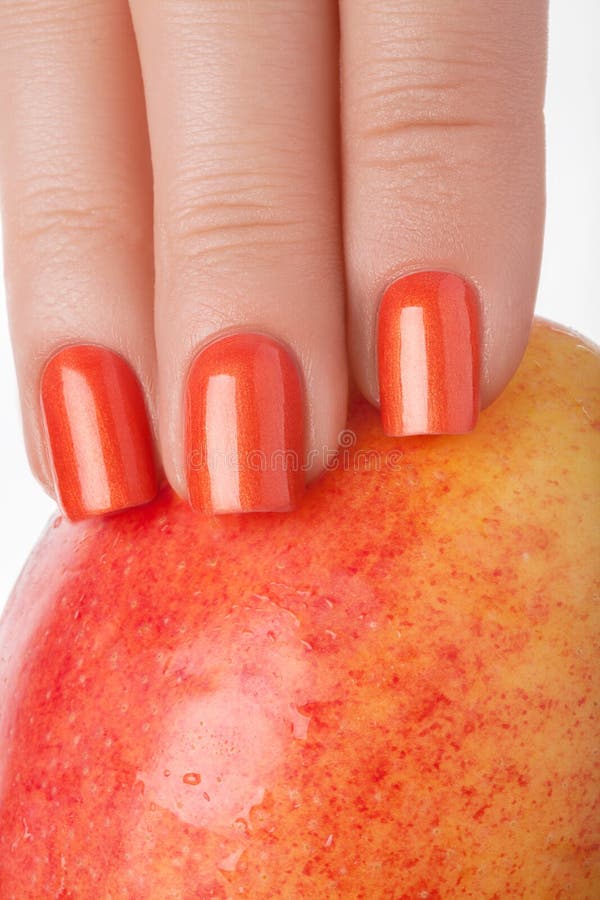 Orange nail polish. stock photo. Image of cosmetics, aesthetics - 63230134
