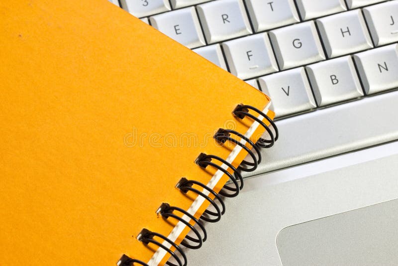 Orange Notebook on a White Backround Stock Photo - Image of notebook ...
