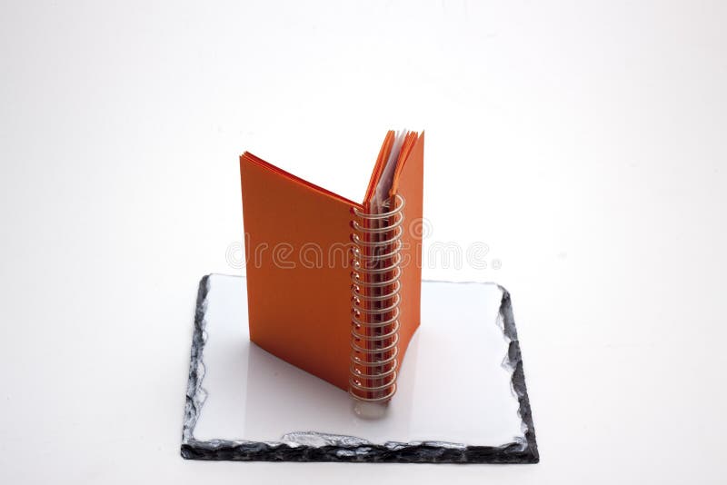 Orange notepad stock image. Image of school, clipping - 93210859