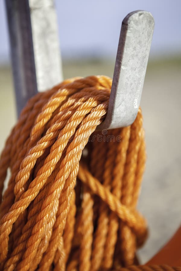 Orange Nylon Safety Rope Coiled on Metal Hook Stock Photo - Image of ...