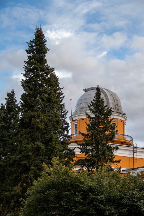 Orange Observatory Building Behind Spruce Trees in Park Stock Photo ...
