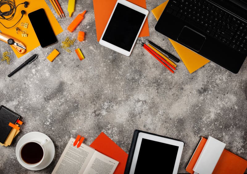 Orange Office Accessories and Gadgets on the Desk. Copy Space Top View ...