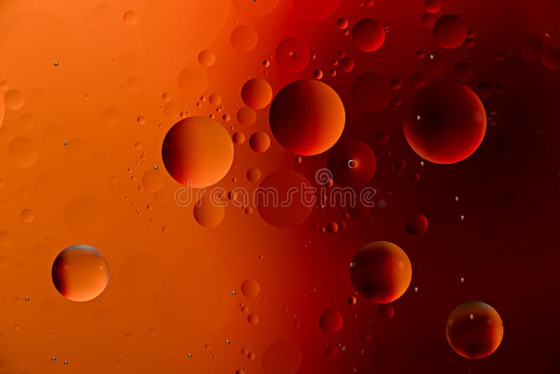 Orange Oil Drops on Water Surface with Effect Duotone Stock Photo ...