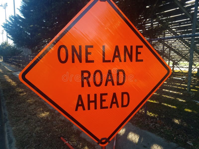 Orange One Lane Road Ahead Construction Sign Stock Image - Image of ...