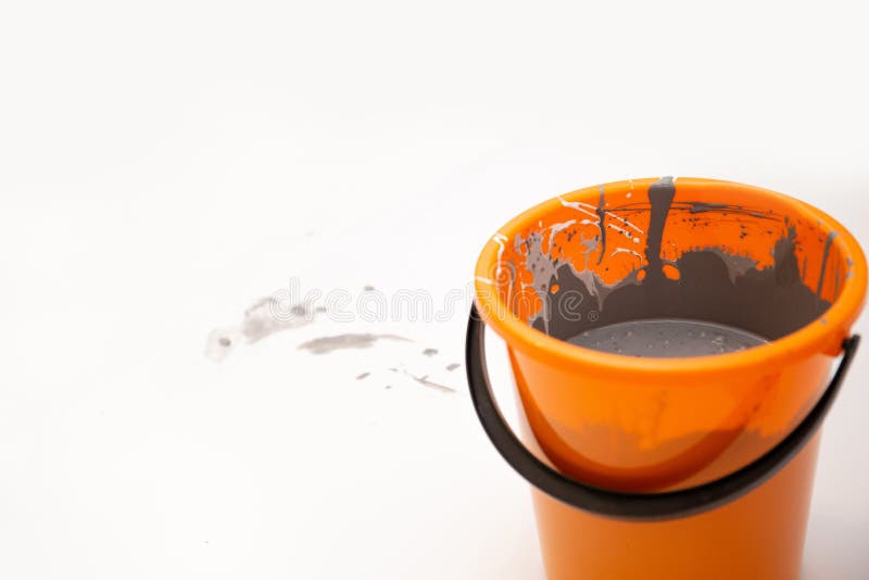Orange Pail with Gray Paint on White Background Stock Image - Image of ...