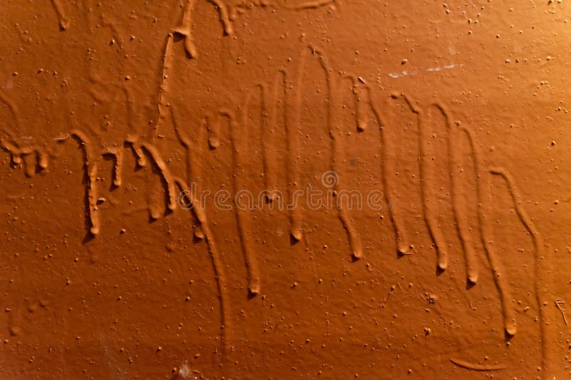 Orange Painted Surface. Paint Texture with Streaks on a Concrete Wall ...