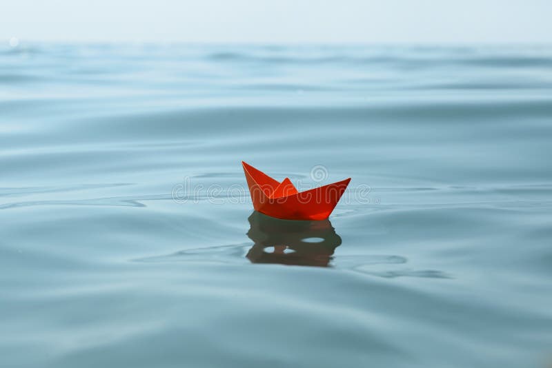 Orange Paper Boat Floating on Water Surface Stock Image - Image of ...