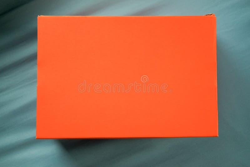 Orange paper box package stock photo. Image of female - 133357566