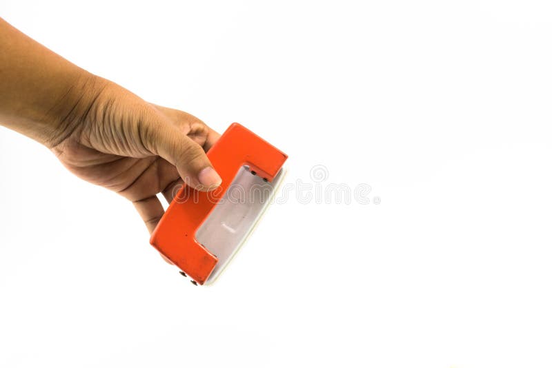 An Orange Paper Punch on the Hand of Man Isolated Stock Image - Image ...