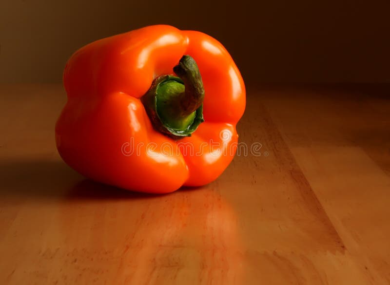 Orange Paprika on a Wooden Table Stock Image - Image of appetizing ...