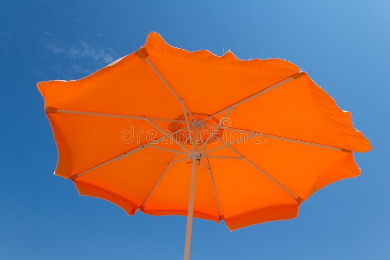 Orange Parasol Against a Blue Sky Stock Photo - Image of beautiful ...