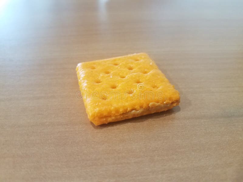 Orange Peanut Butter Cracker on Brown Wood Table Stock Image - Image of ...