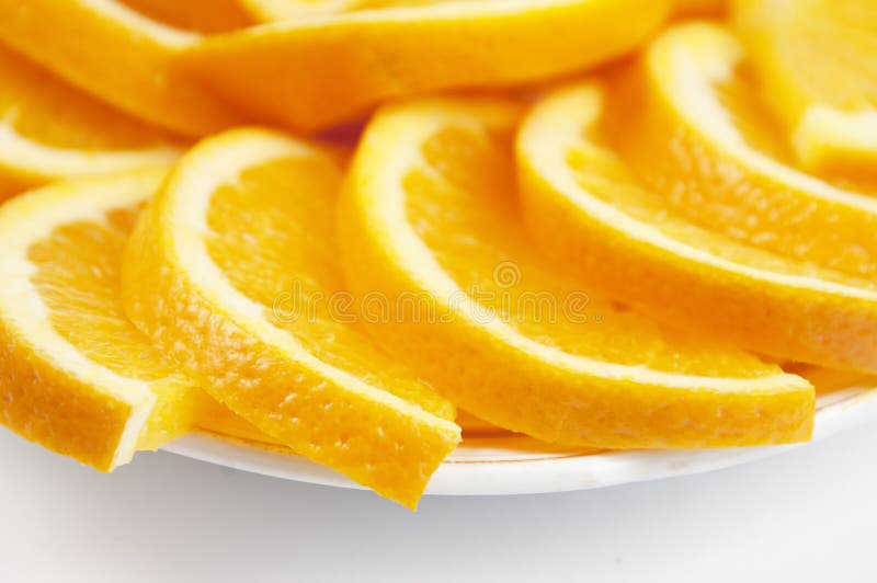 Orange pieces on a plate stock image. Image of vegetarian - 24824553
