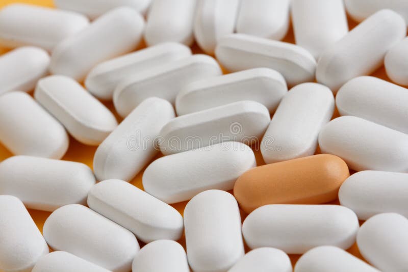 Orange Pill among White, Macro Stock Image - Image of drug, vitamin ...