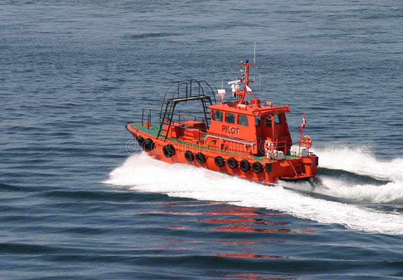 Orange pilot boat stock image. Image of tourist, guard - 63466053