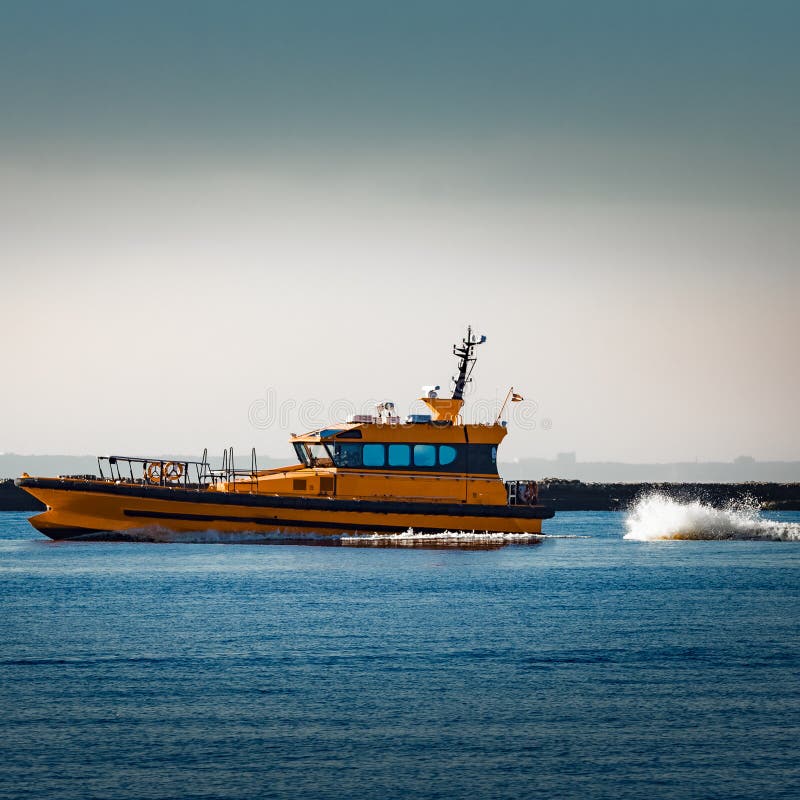 Orange tug/pilot boat stock photo. Image of tourism, cruise - 8112742