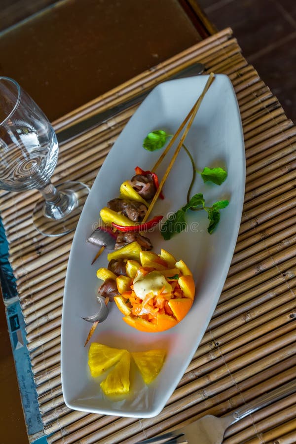 Orange and Pineapple Appetizer on Plate in Restaurant or Stock Photo ...
