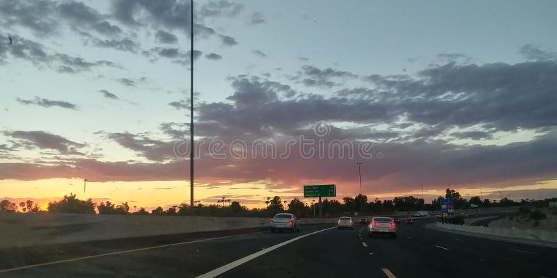 Sunset over highway stock image. Image of sunset, highway - 100761445