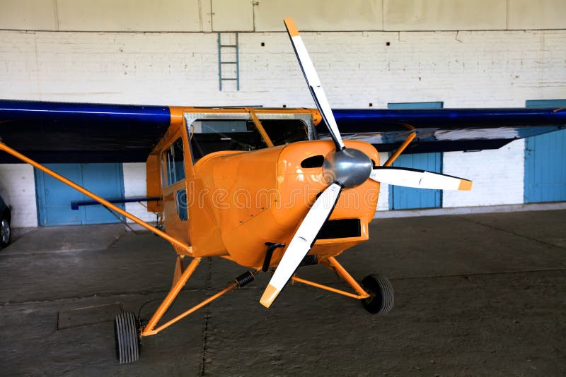 Orange plane with stock photo. Image of objects, hawker - 50425986