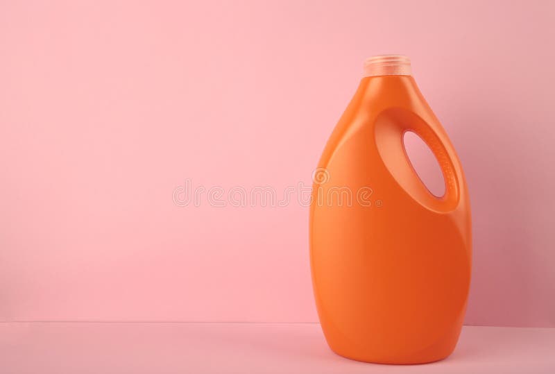 Orange Plastic Bottle with Liquid Laundry Detergent or Cleaning Agent ...
