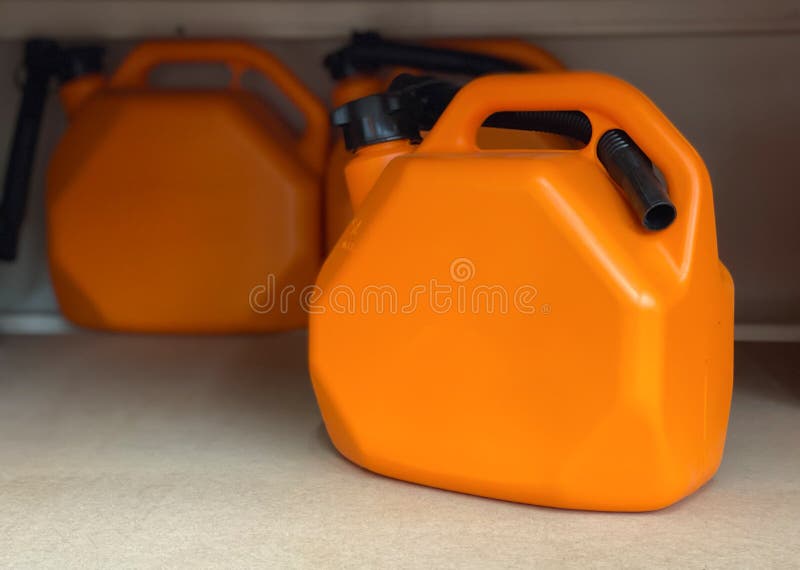 Orange Plastic Canister on Store Counters Stock Photo - Image of sale ...