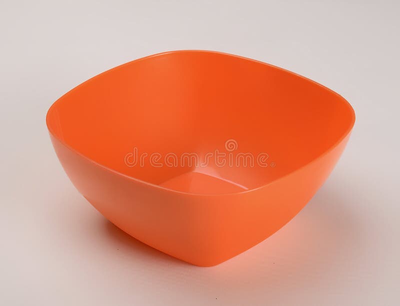 Orange plastic deep dish stock photo. Image of studio - 86482456