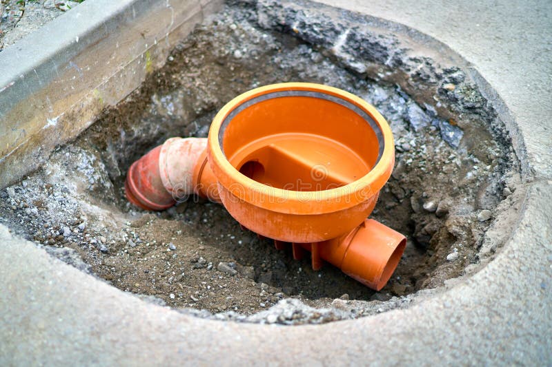Orange Plastic Drain Pipe Preparing for Installation in Urban ...