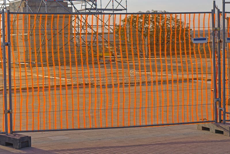 Orange construction fence stock image. Image of fence - 201270625