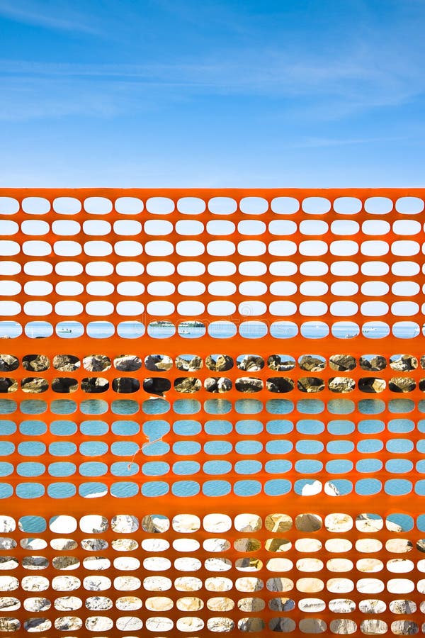 Orange Plastic Grid Around a Construction Site on the Coastline Stock ...