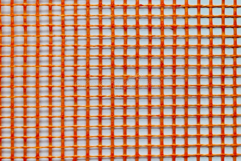 Orange Plastic Grid on White Background Surface Stock Image - Image of ...