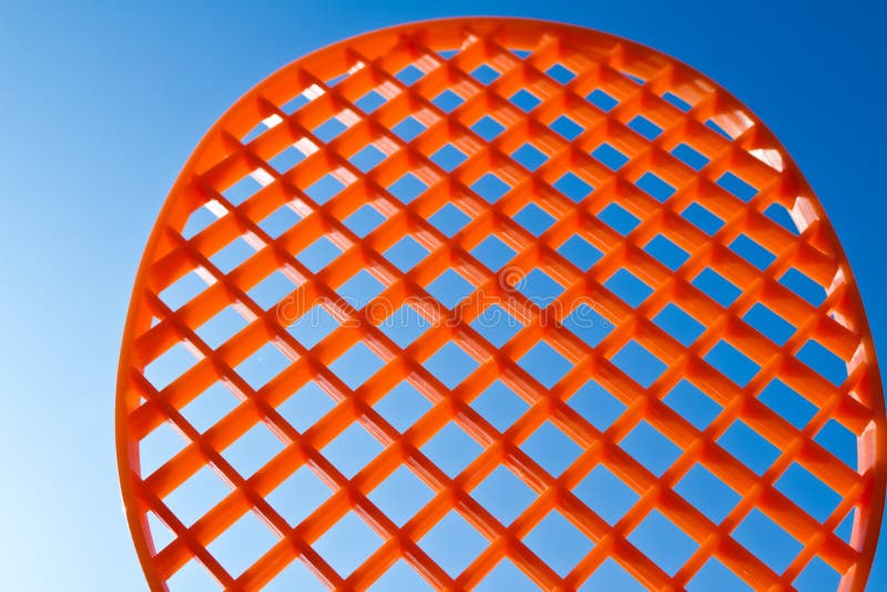 Orange plastic racket stock image. Image of leisure - 123352871