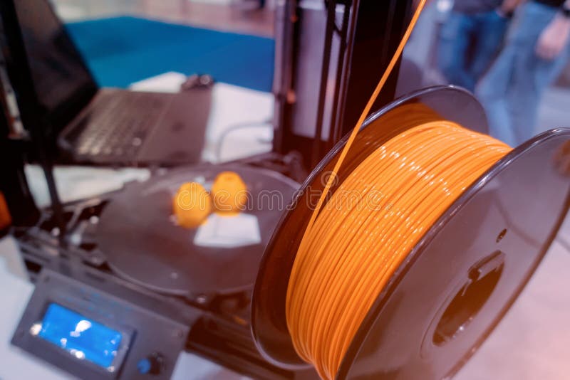 Orange Plastic Wire for 3D Printer Stock Image - Image of laboratory ...
