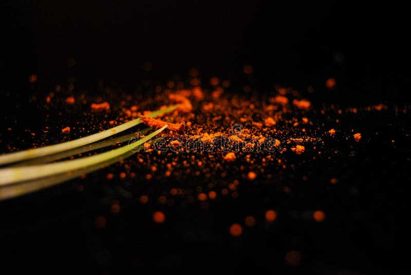 Orange Pollen Leaning on Black Table Stock Photo - Image of ...