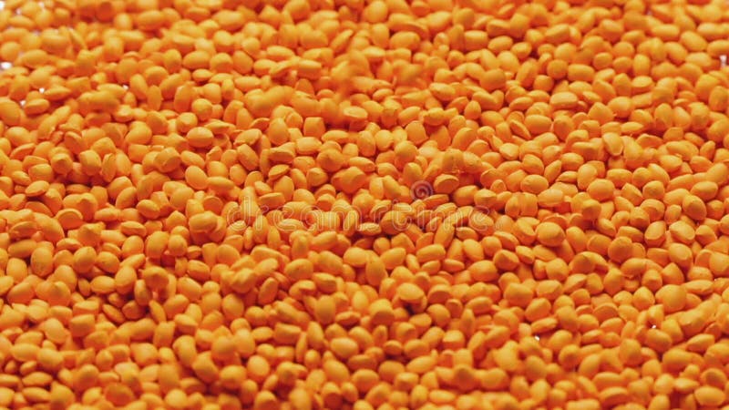 Orange Polymer Dye in Granules, Background Texture Stock Footage ...