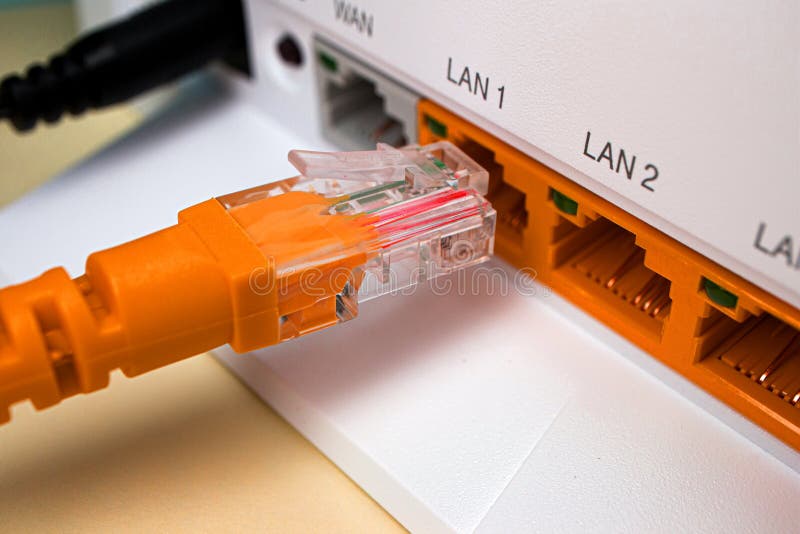 The Orange Port and the Orange Cable is Connected To the Internet at ...